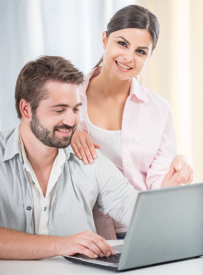 Young couple at home stock image. Image of beautiful - 57287437