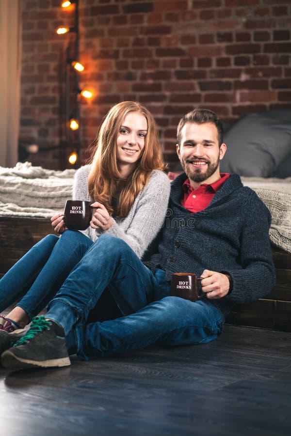 Young couple at home stock photo. Image of interior, family - 80605656