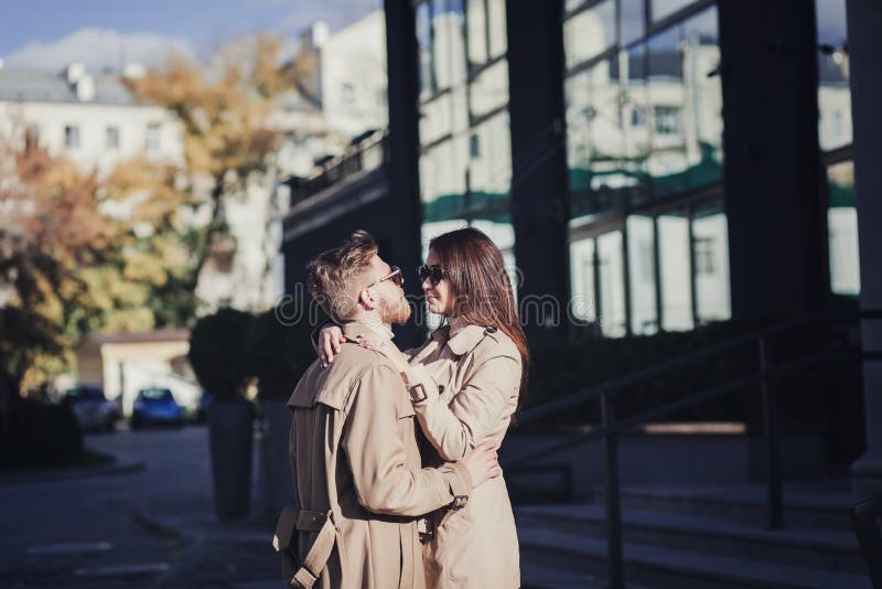 Couple hugging in a coat stock image. Image of coat - 165113643