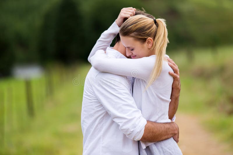 Young couple hugging stock photo. Image of love, looking - 50963450
