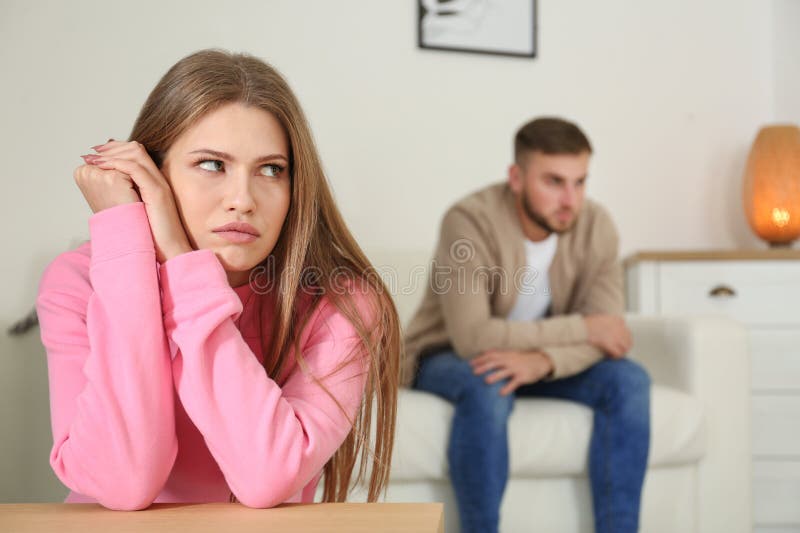 Couple Ignoring Each Other after Argument in Living Room Stock Photo ...