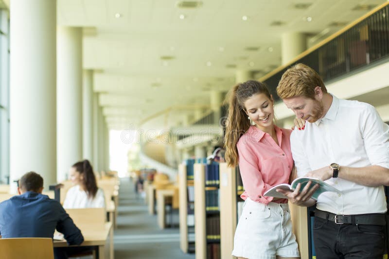 Couple in library stock image. Image of love, chair, face - 7568463