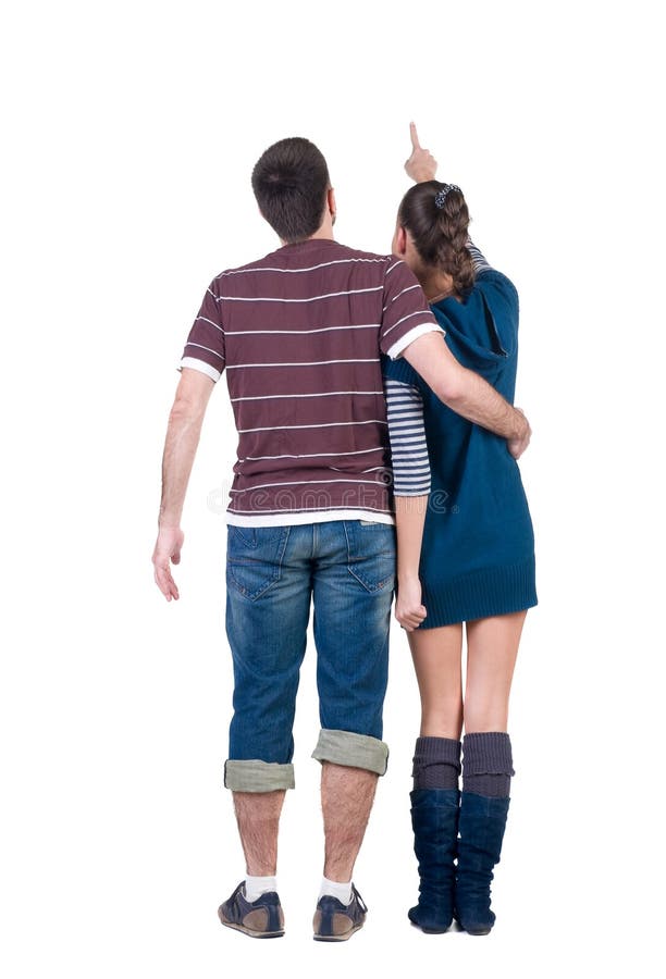 Young Couple Looks Where that. Rear View Stock Photo - Image of ...