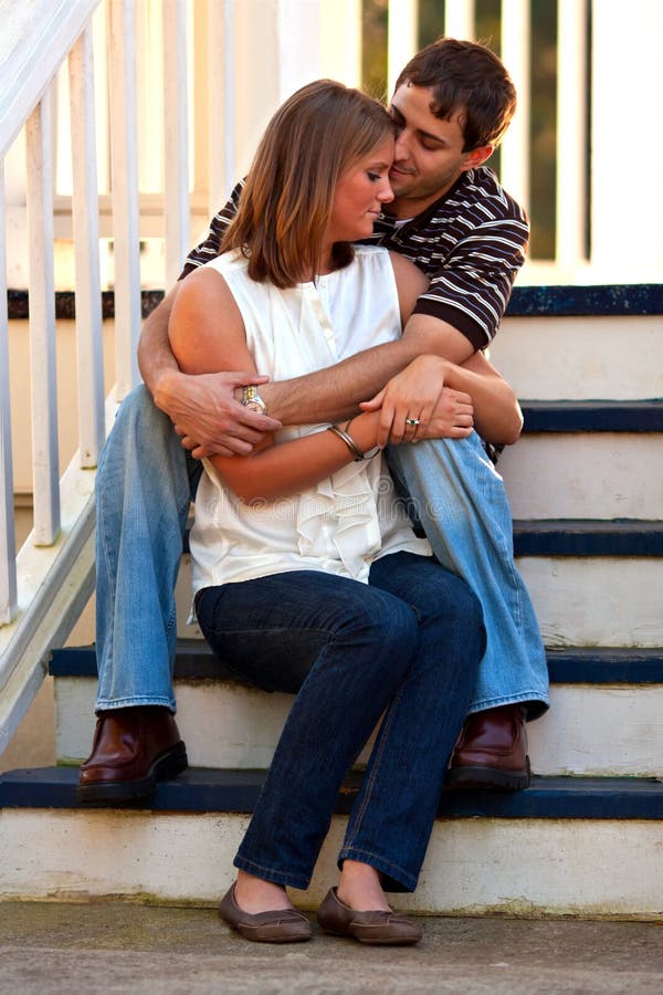 Young Couple in Love Embrace on Steps Stock Image - Image of embrace ...