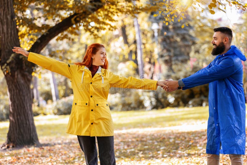 Couple in Love is Enjoying in Park after Rain Stock Photo - Image of boyfriend, couple: 296723458