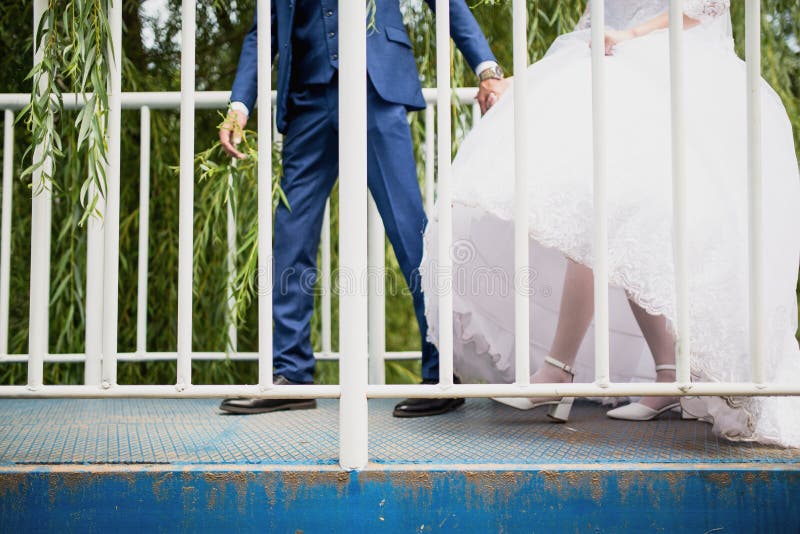 Young Couple in Love Holding Hands and Looking into the Distance Stock ...