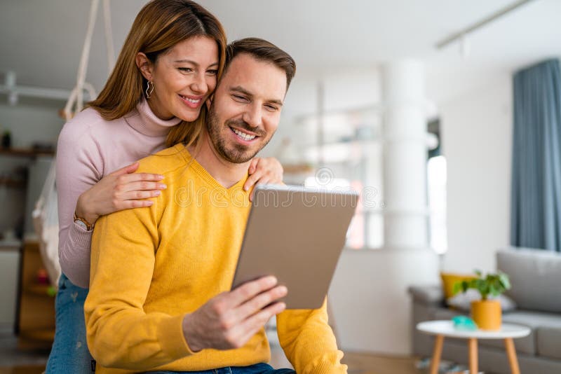 Young Couple in Love at Home Websurfing on Internet Stock Image - Image ...