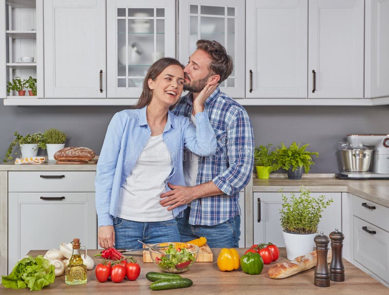 Young Couple in Love in the Kitchen Stock Photo - Image of holiday ...