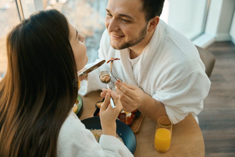 Young Couple in Love at Romantic Breakfast in Cozy Setting Stock Photo ...