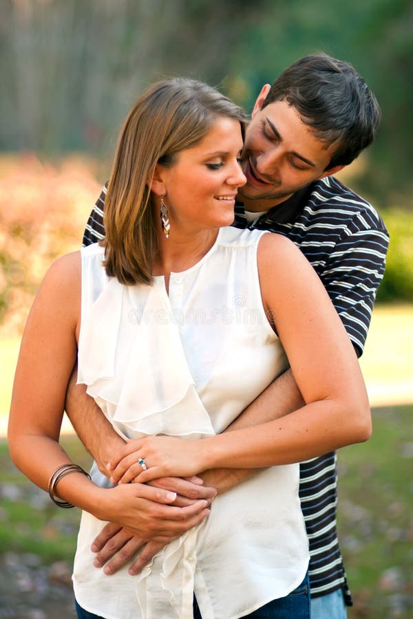 Young Couple in Love Share a Warm Embrace Stock Image - Image of ...