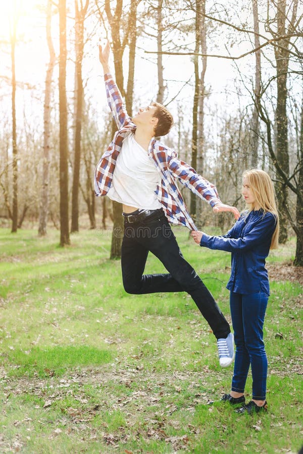 Young Couple in Love Walking at the Spring Park Stock Image - Image of ...