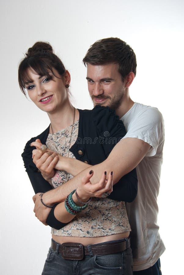 Young Couple in Loving Embrace Stock Photo - Image of couple, caucasian ...