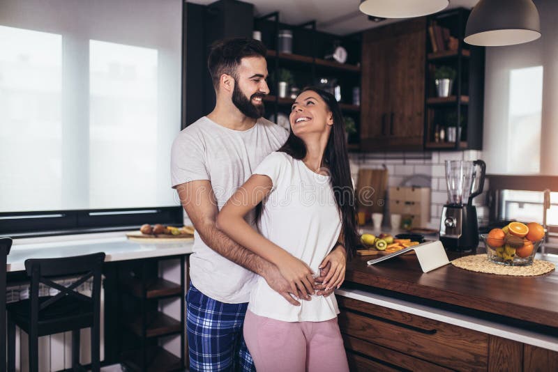 Couple Making Breakfast at Home. Loving Couple Having Fun in Kitchen ...