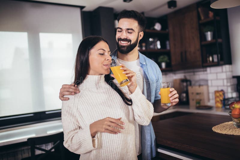 Couple Making Breakfast at Home. Loving Couple Having Fun in Kitchen ...