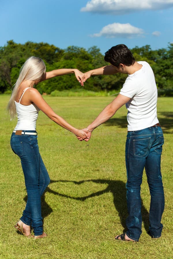 Couple Making Love Sign Arms Outdoors Stock Photos - Free & Royalty ...