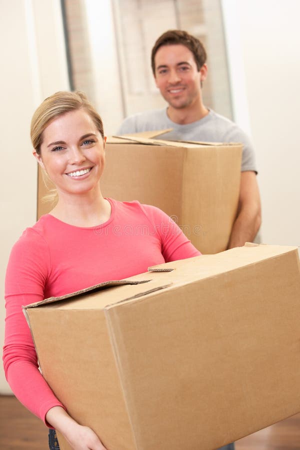 Young couple on moving day stock image. Image of moving - 18044329