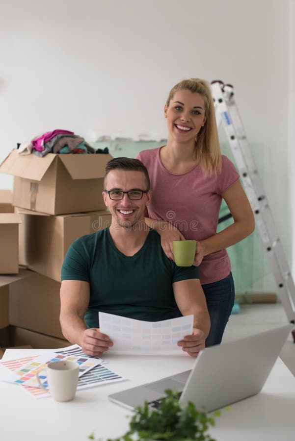 Young Couple Moving in a New Home Stock Image - Image of happy ...