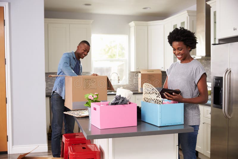 Young Couple Moving in To New Home Together Stock Photo - Image of ...