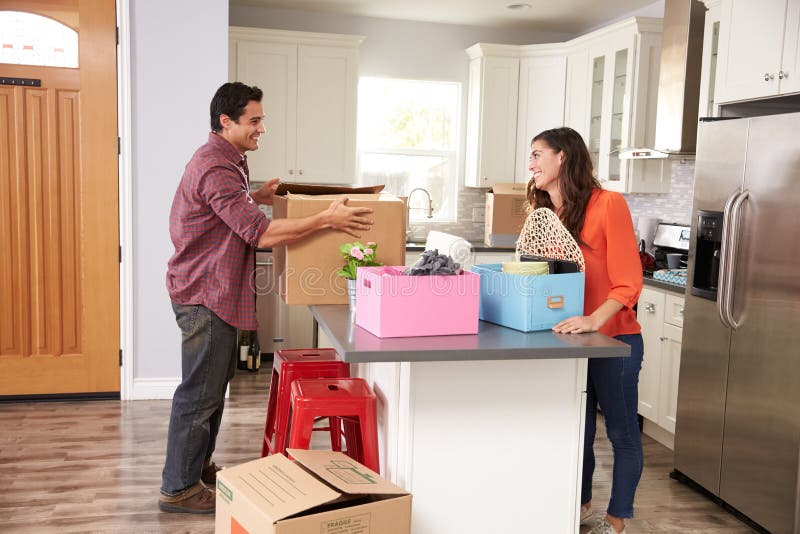Portrait of Young Couple Moving in To New Home Together Stock Photo ...