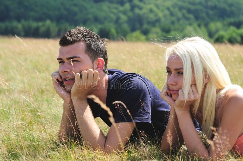 Young couple in nature stock image. Image of love, casual - 25801151