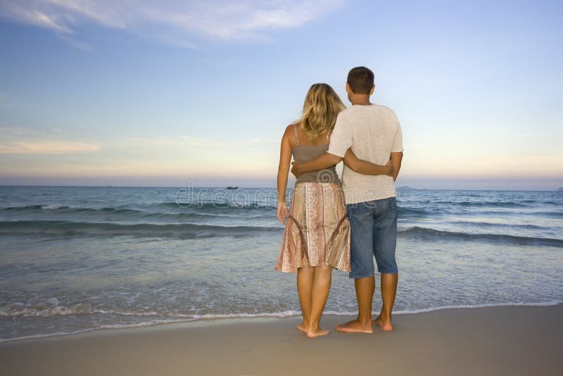 Young Couple Near the Ocean Stock Photo - Image of relaxation, couple ...