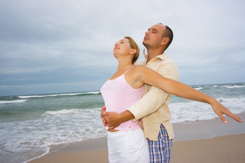 Young Couple Kissing Near the Ocean Stock Image - Image of nature ...