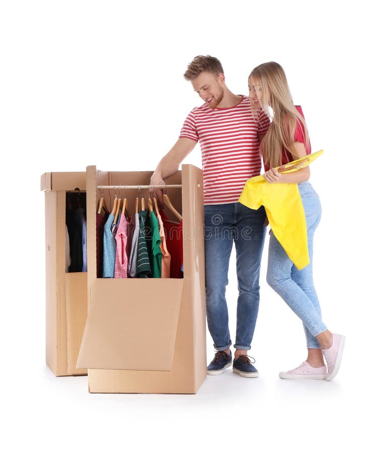Young Couple Near Wardrobe Boxes on White Stock Image - Image of ...