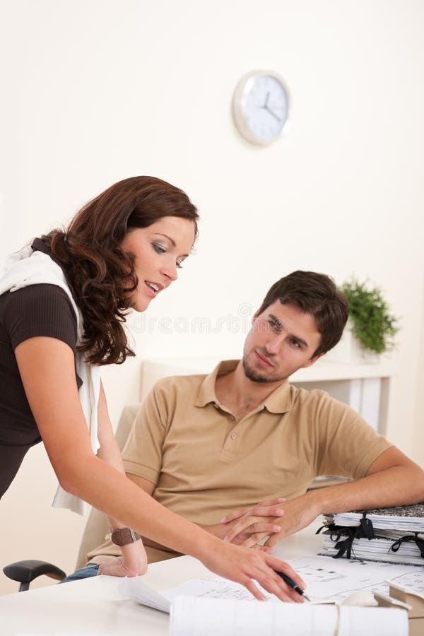Young couple at office stock photo. Image of engineer - 11580482