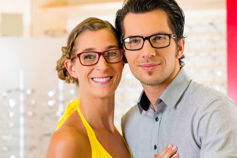 Young Couple at Optician with Glasses Stock Photo - Image of modern ...