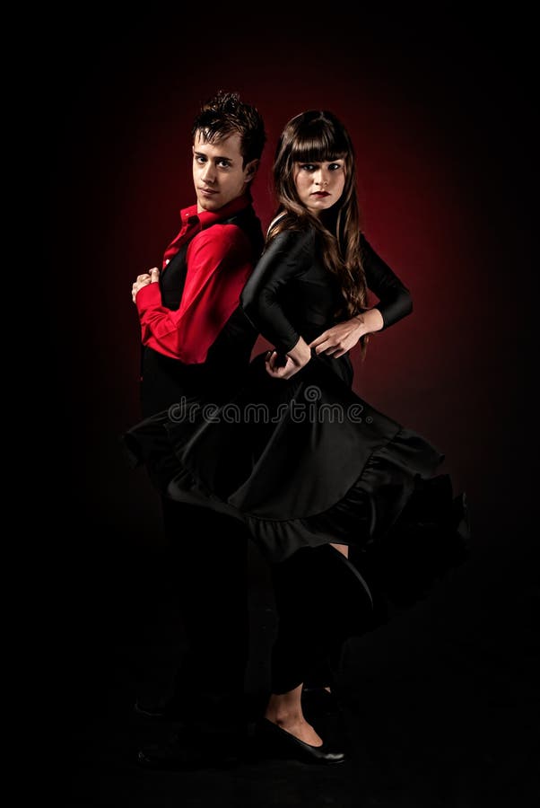 Young Couple Dancing Passion on Dark Red Light Stock Photo - Image of ...