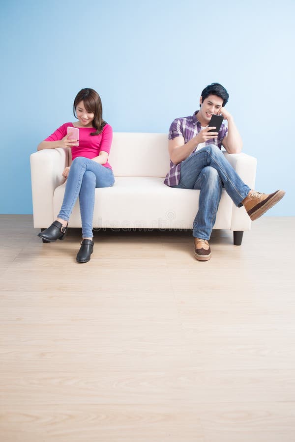 Young Couple Play Phone Happily Stock Photo - Image of network, room ...