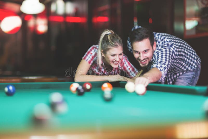 Young Couple Playing Together Pool in Bar Stock Image - Image of adult ...