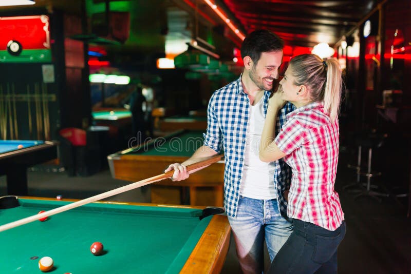 Young Couple Playing Together Pool in Bar Stock Photo - Image of ...