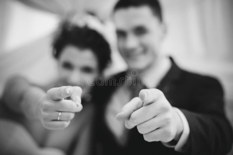 Young couple pointing stock photo. Image of point, people - 18601494