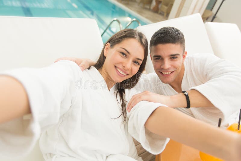 Young couple by the pool stock photo. Image of relationship - 50297098