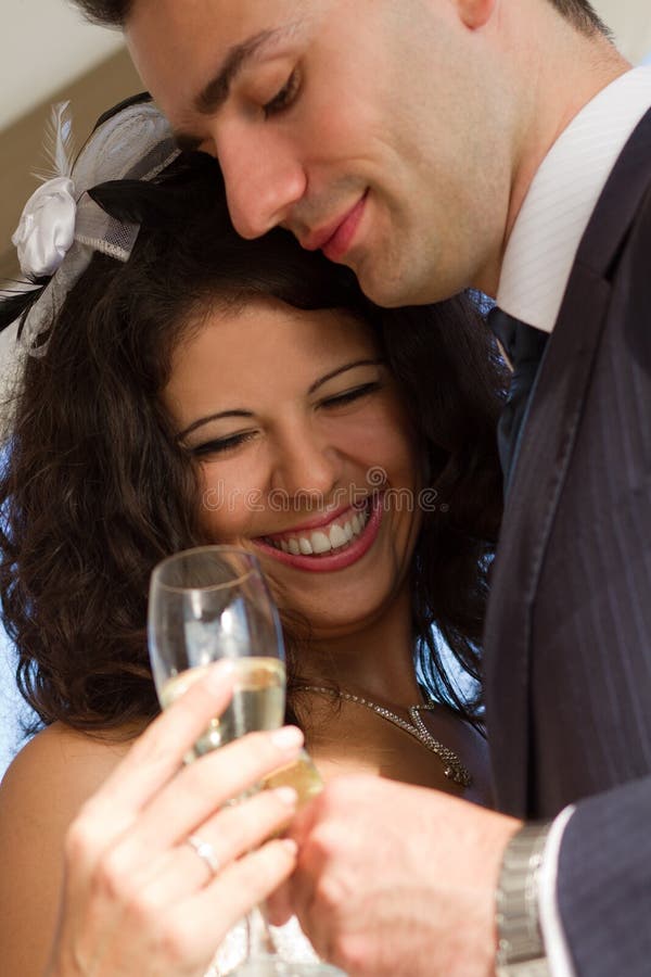 Young Couple Raising Wedding Toast Stock Photo - Image of outdoors ...