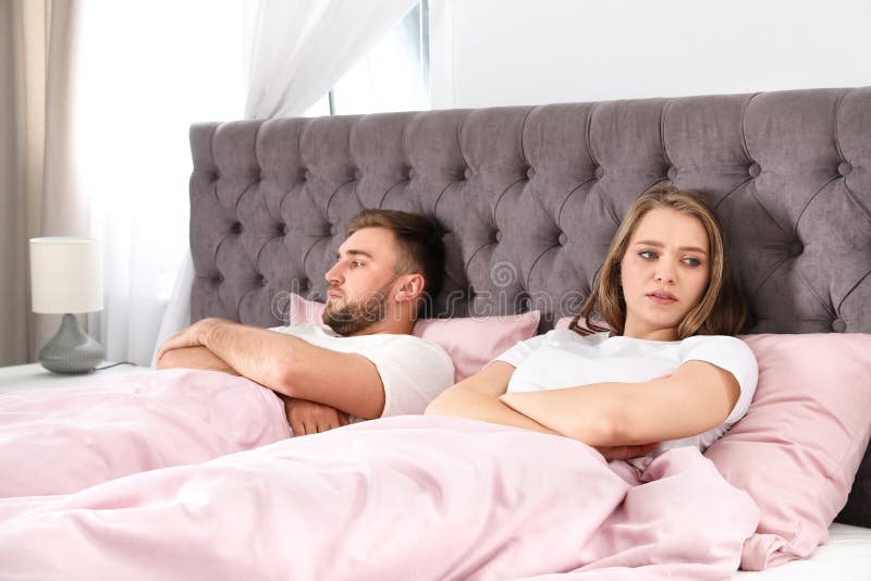 Young Couple with Relationship Problems in Bed Stock Photo - Image of ...