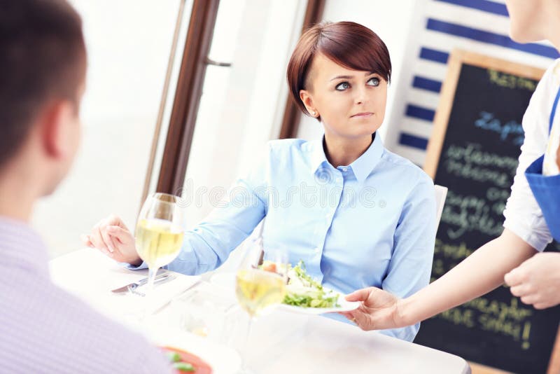 Young Couple in a Restaurant Stock Photo - Image of happy, table: 39044192