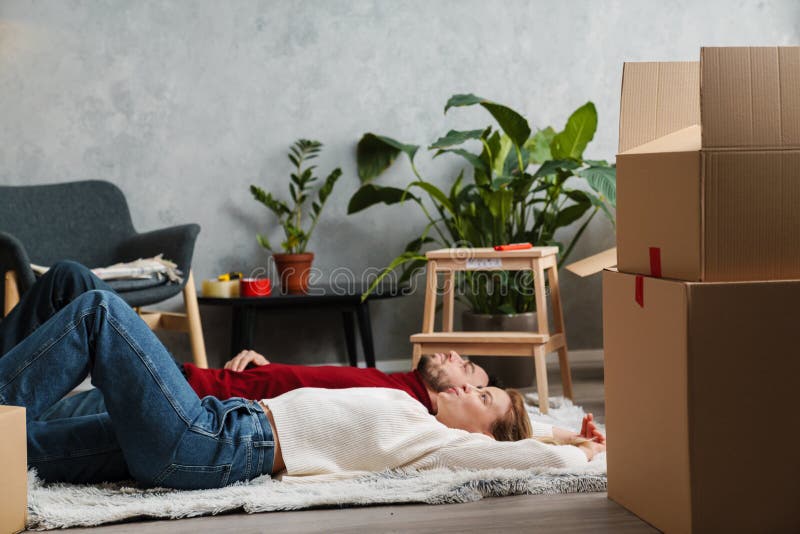 Young Couple Resting while Moving Stock Image - Image of caucasian ...