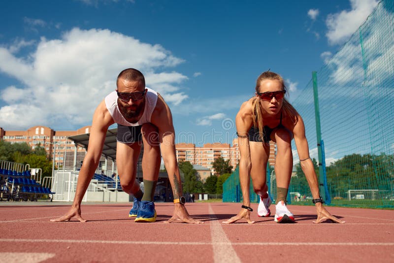 Young Couple Runner at the Start Treadmill Stock Photo - Image of ...