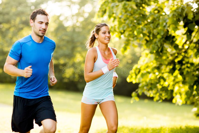 Couple Running in Urban Enviroment Stock Image - Image of male, active ...