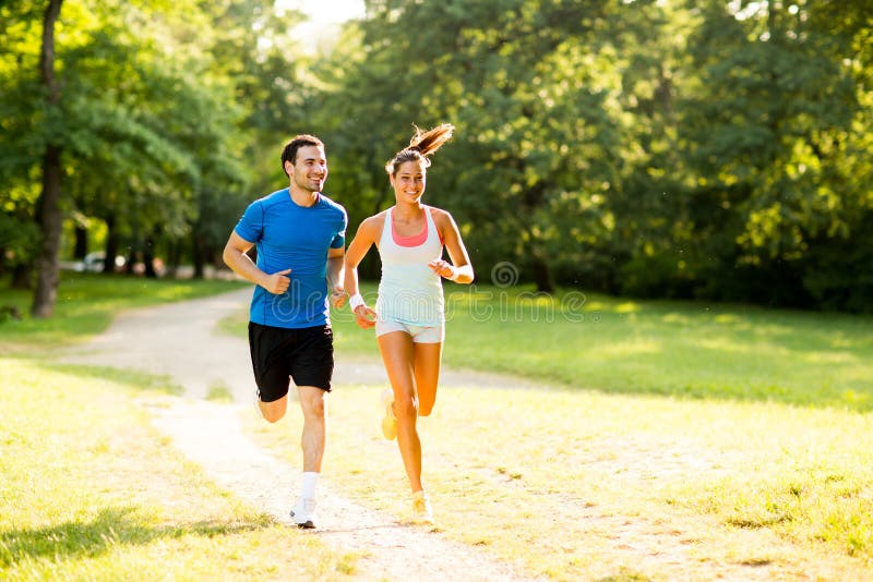 Young couple running stock image. Image of couple, together - 55040325