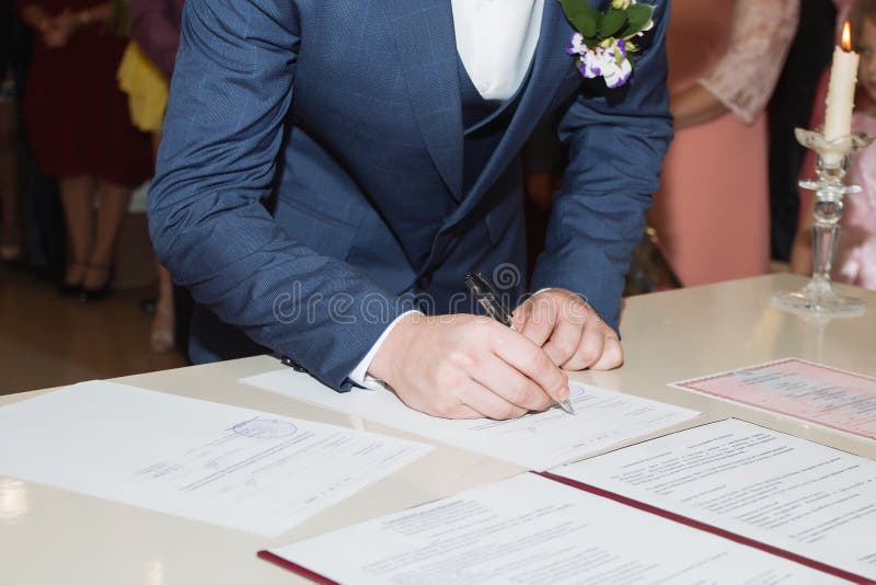 Couple Signing Marriage Documents Stock Photos - Download 346 Royalty ...
