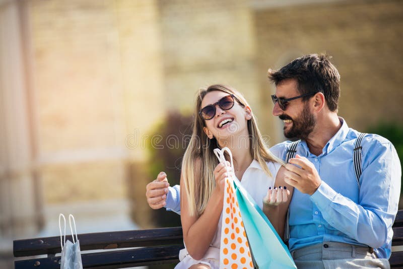 Couple Sitting on Bench after Shopping Stock Image - Image of bench ...