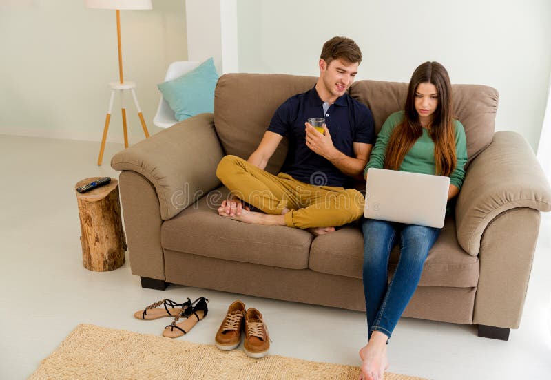 Watching Something on a Laptop Stock Photo - Image of relationship ...