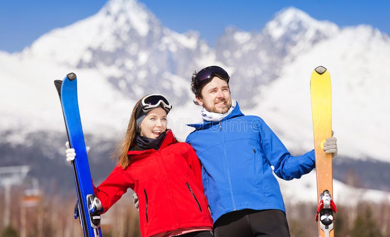Young couple skiing stock image. Image of activity, mountains - 61036593