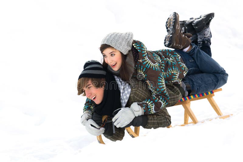 Young couple sledding stock image. Image of freezing - 12619453
