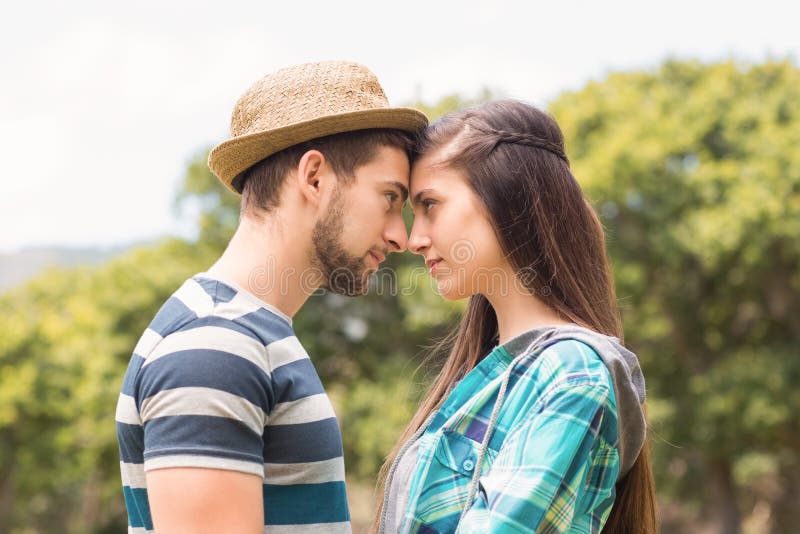 Young Couple Smiling at Each Other Stock Photo - Image of cheerful ...
