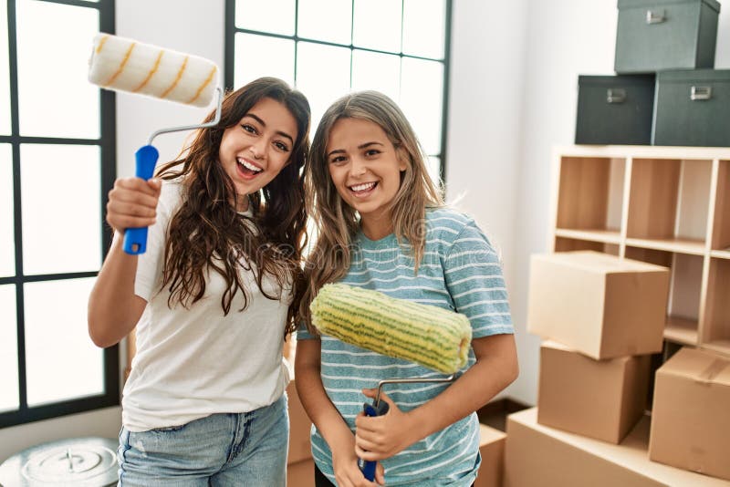 Young Couple Smiling Happy Moving at New Home Stock Photo - Image of ...