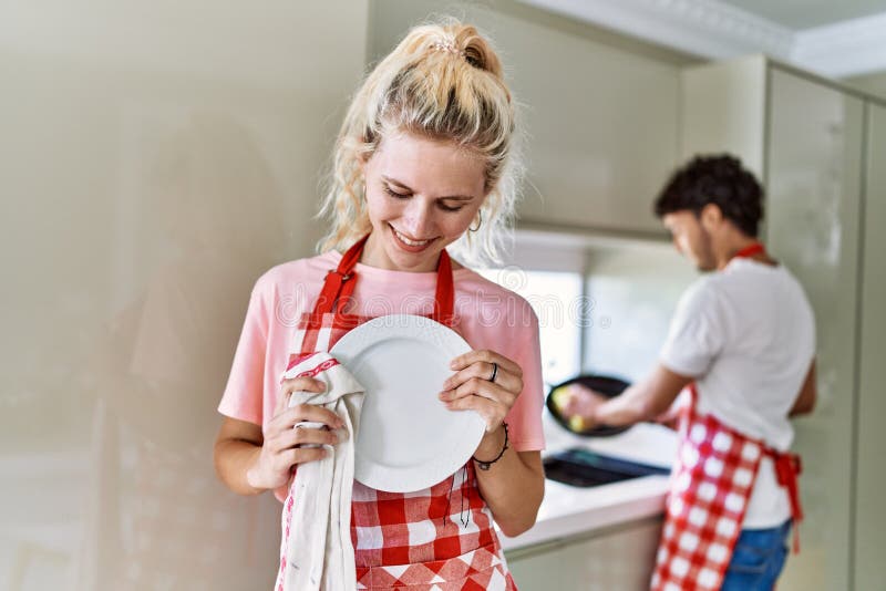 Young Couple Smiling Happy Washing Dishes at Kitchen Stock Photo ...